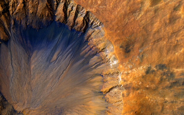 Scientists have found a body of liquid water on Mars for the first time ...